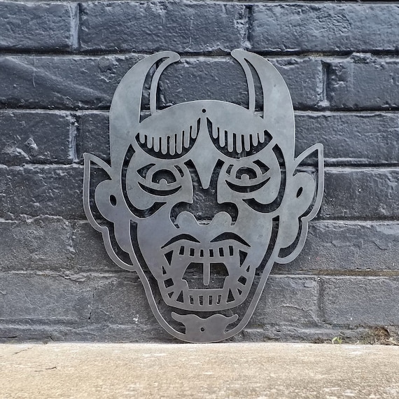 Traditional Demon Face Tattoo