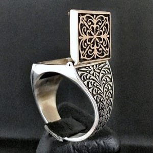 ring with knife hidden inside