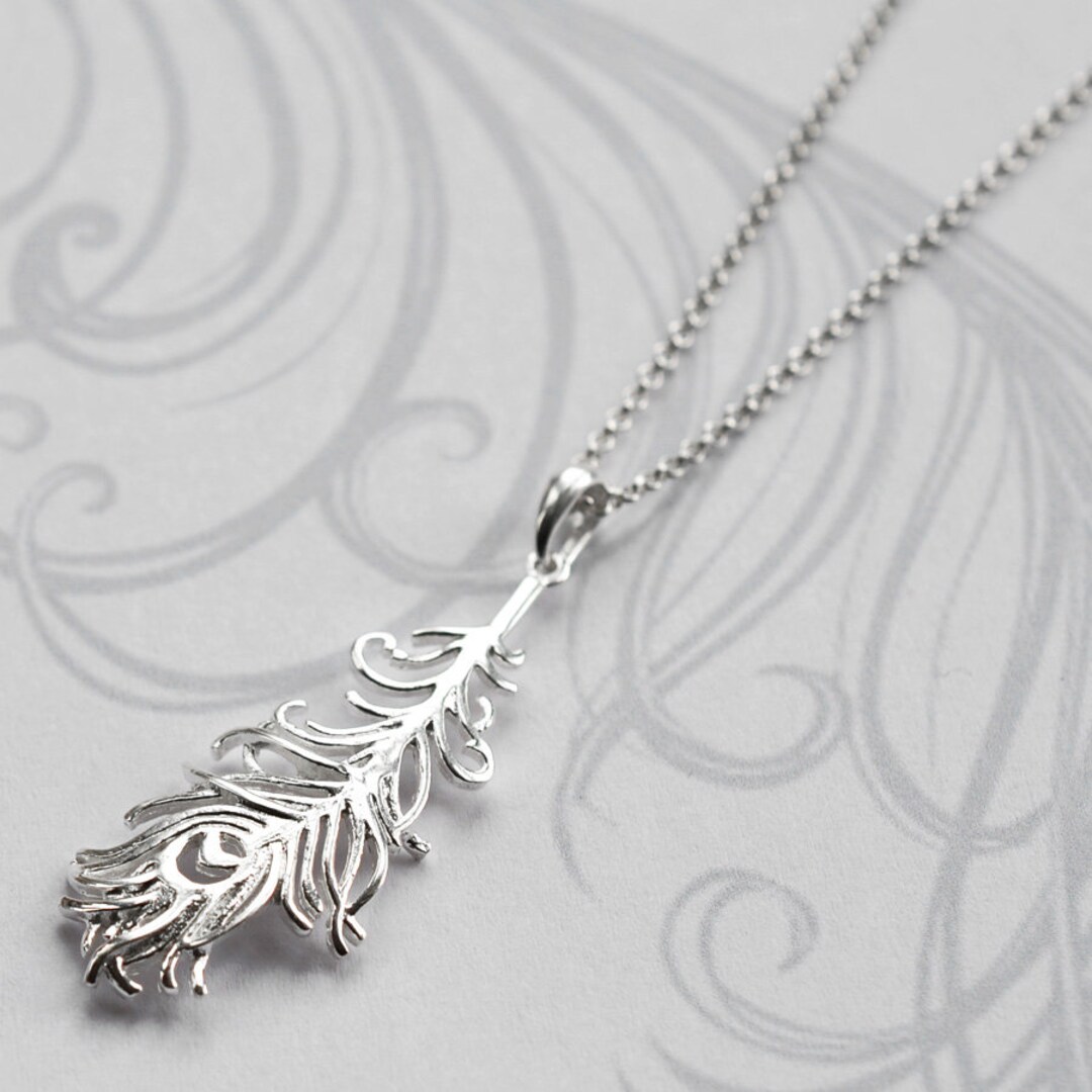 Silver peacock pendant store