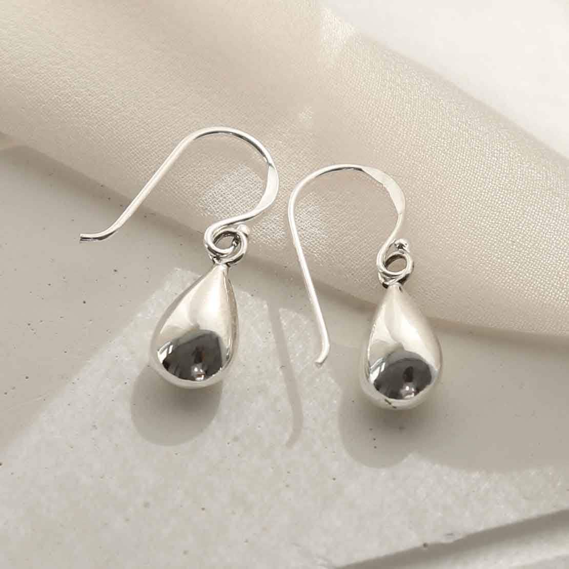 Solid sterling silver teardrop earrings store