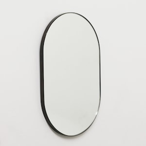 Capsula™ Capsule Shaped Modern Customisable Mirror With a Bronze Patina ...