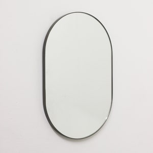 Capsula™ Capsule Shaped Modern Customisable Mirror With a Bronze Patina ...