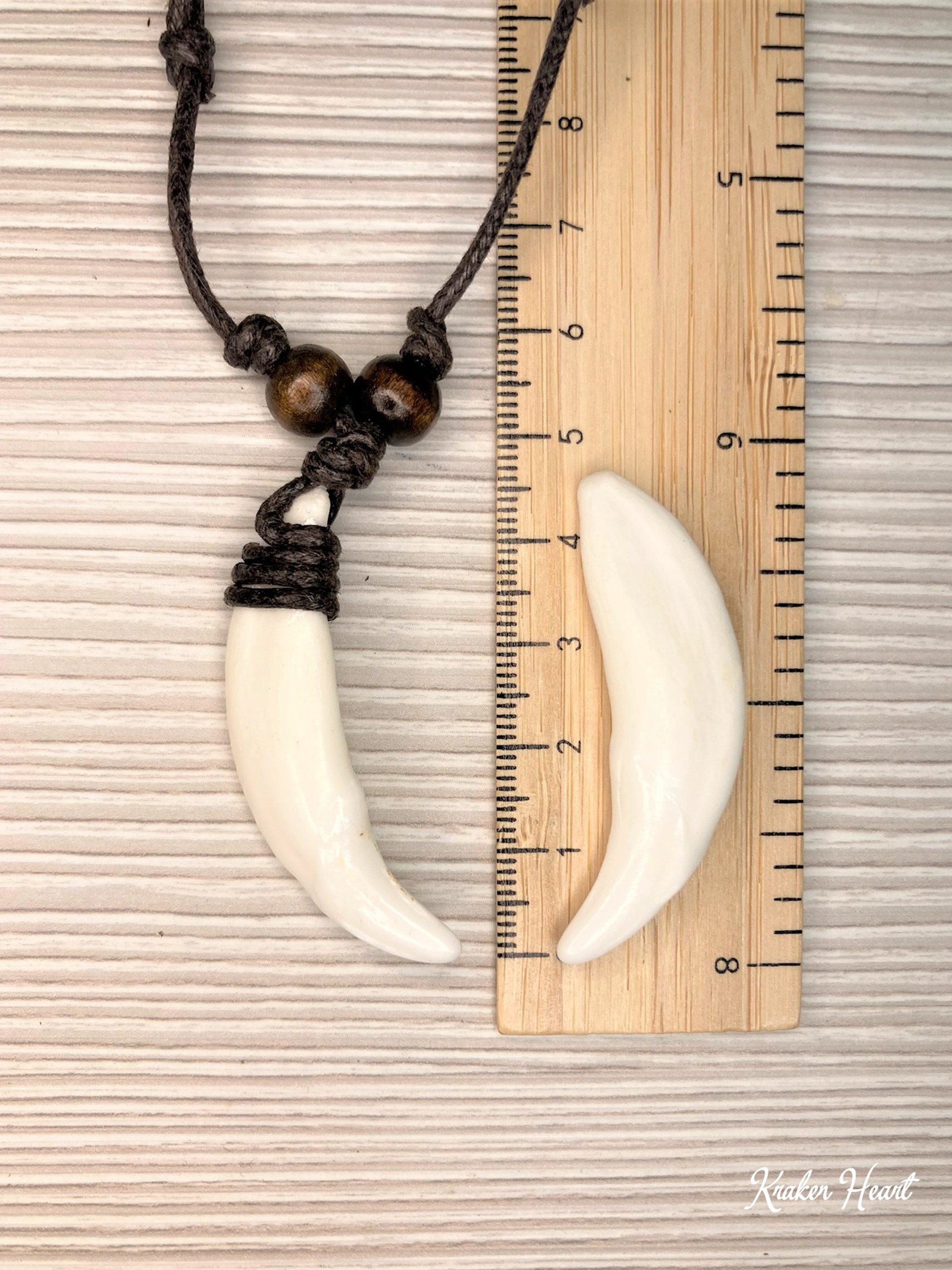 wolf tooth charm