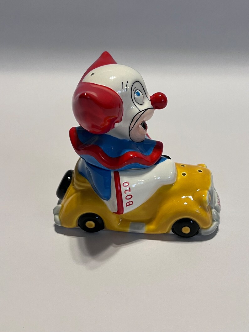 Vintage 1996 Bozo the Clown Salt & Pepper Shakers Yellow Car Star Jars ...