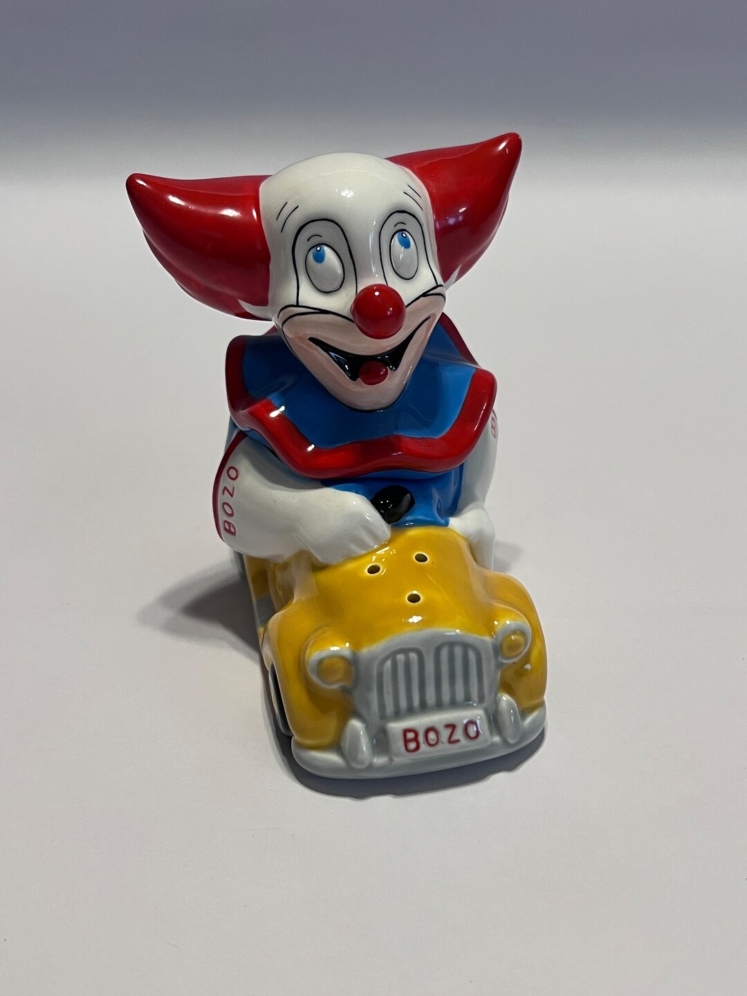Vintage 1996 Bozo the Clown Salt & Pepper Shakers Yellow Car Star Jars ...