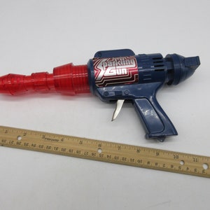 1980's SPARKLING TOY GUN - Etsy