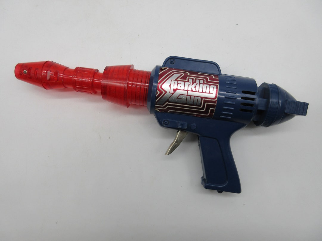 1980's SPARKLING TOY GUN - Etsy