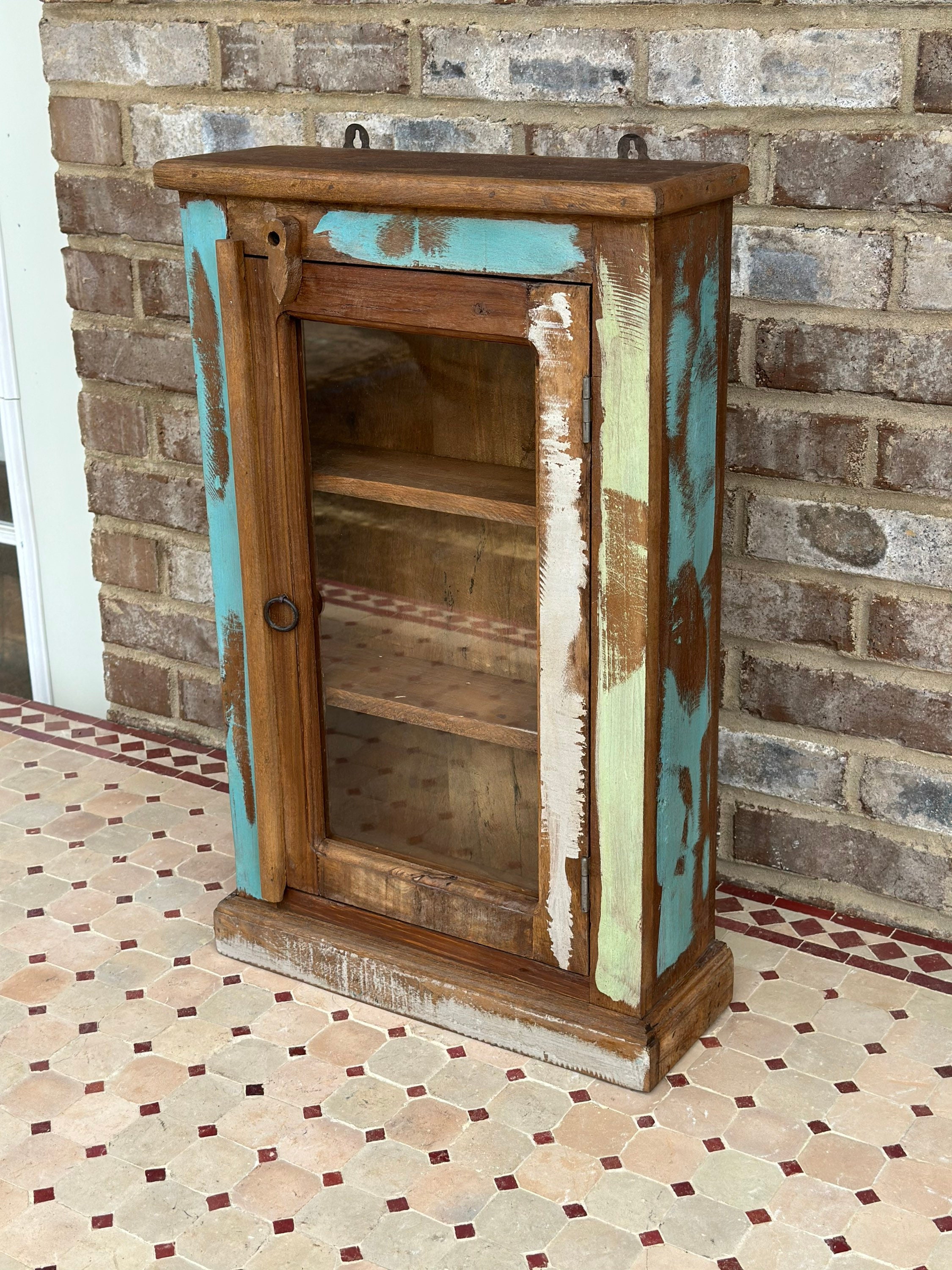 Wall hanging cupboard store