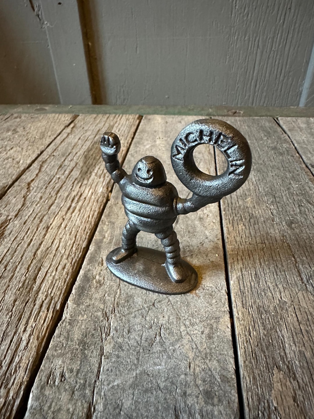 Small 3” Cast Iron Michelin Man Holding Tire Statue Figurine Shelf Art ...