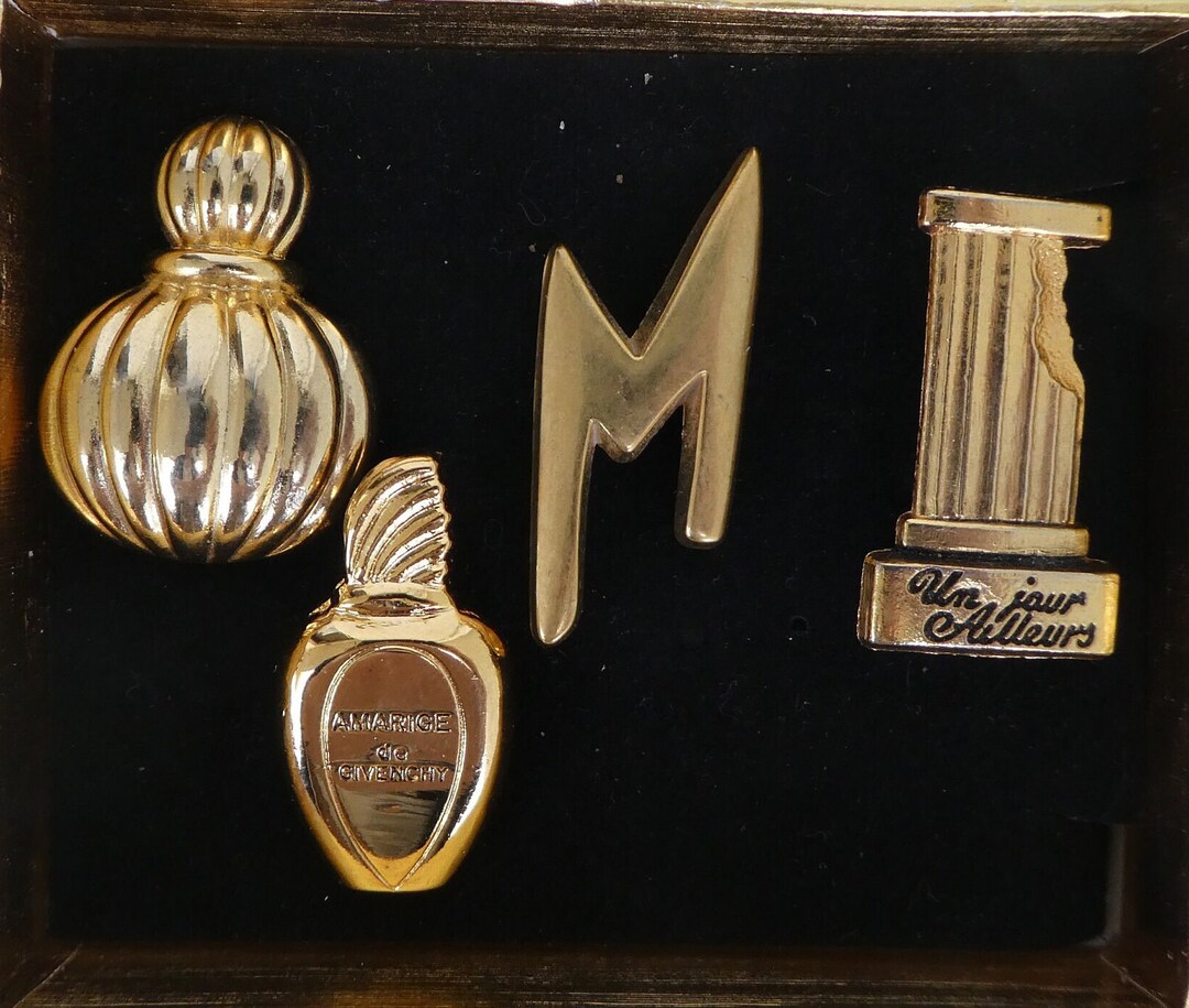 Luxury Collection of PERFUME Pins. Givenchy Amarige, Montana Parums, Un ...