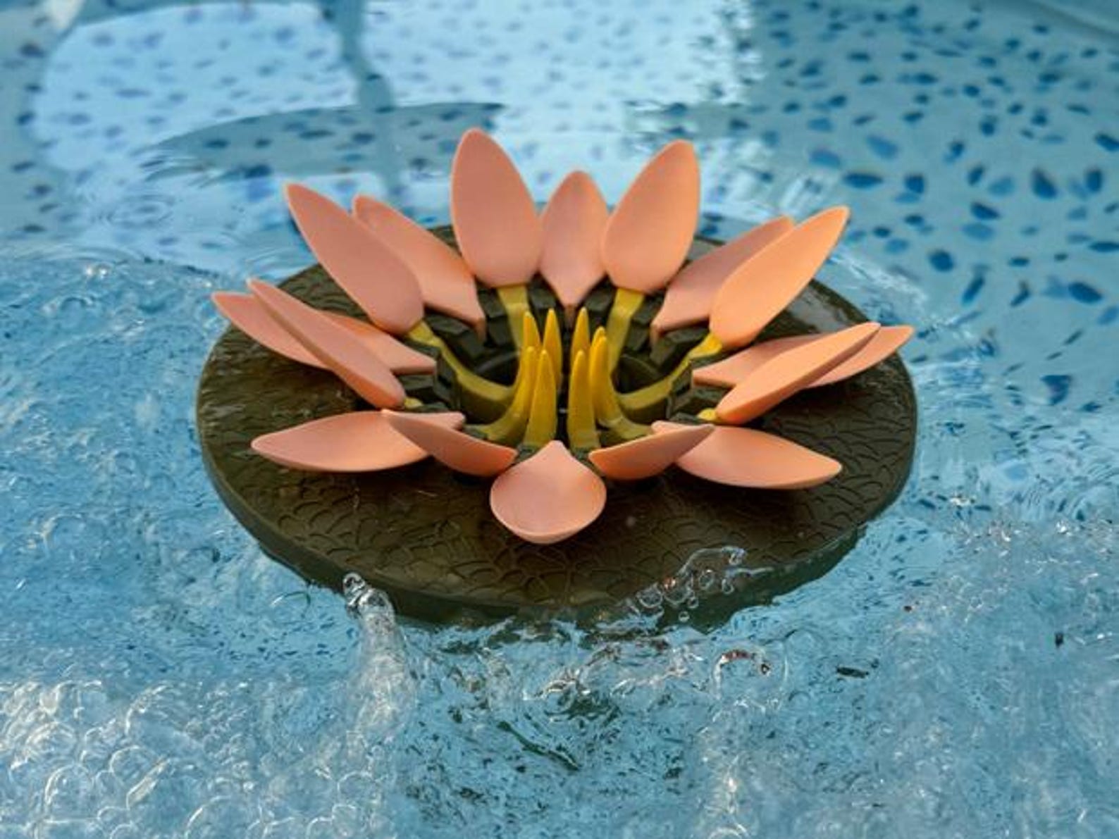 Lily Pad Cupholder With Self-adjusting Petals | Fake Pool Float House ...