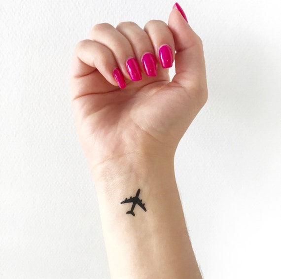 Airplane Finger Tattoo