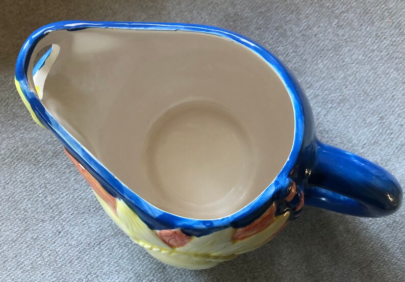 Sunburst Ceramic Pitcher in Relief - Etsy
