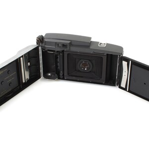 Polaroid 150 Camera Outfit W/ Case/flash(2)/bracket/filter/box of Film ...