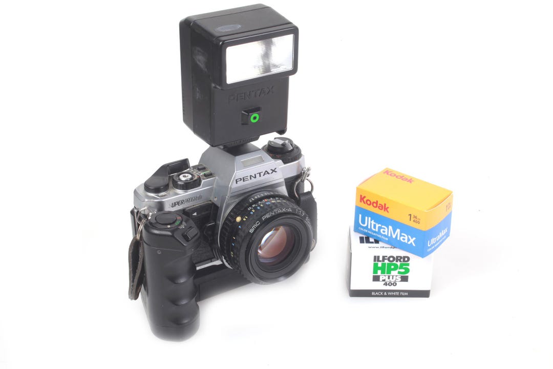 Pentax Super Program 35mm Film Camera Bundle W/ Flash, Winder, and Film ...