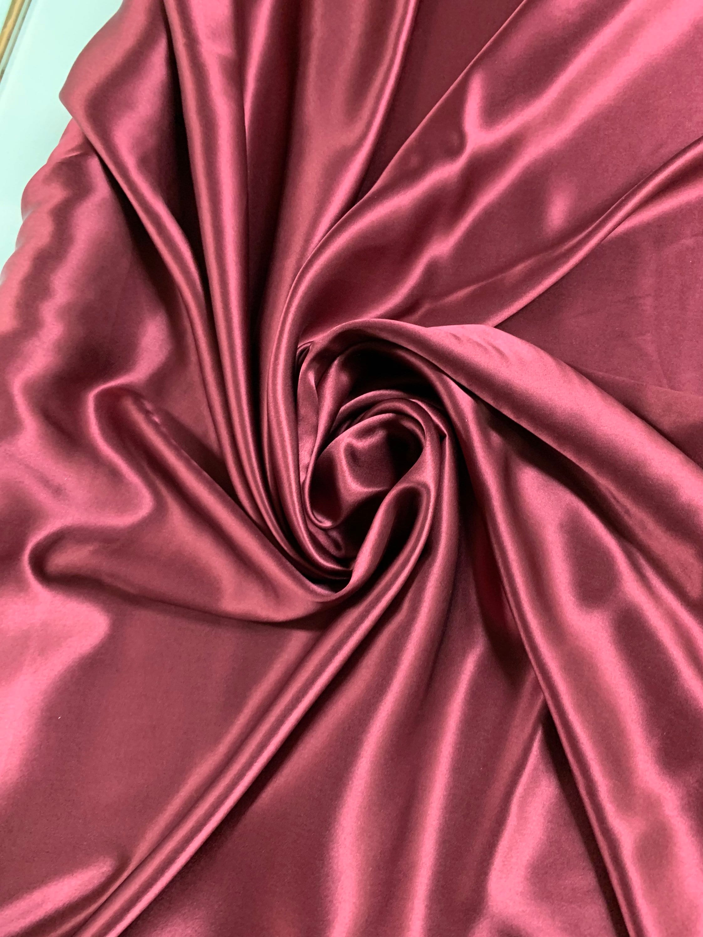 Beautiful wine color silk Charmouse 54” wide. Best used for apparel ...