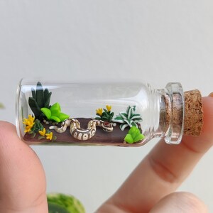 Little Ball Python With a Pyrope Garnet Gemstone in Glas-bottle ...