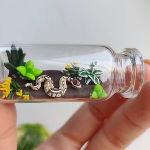 Little Ball Python With a Pyrope Garnet Gemstone in Glas-bottle ...