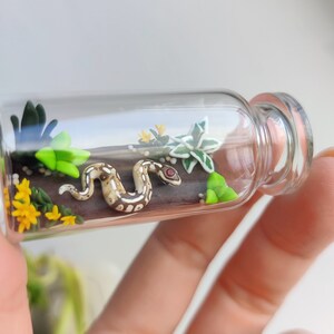 Little Ball Python With a Pyrope Garnet Gemstone in Glas-bottle ...