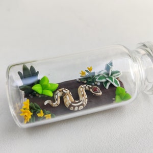 Little Ball Python With a Pyrope Garnet Gemstone in Glas-bottle ...