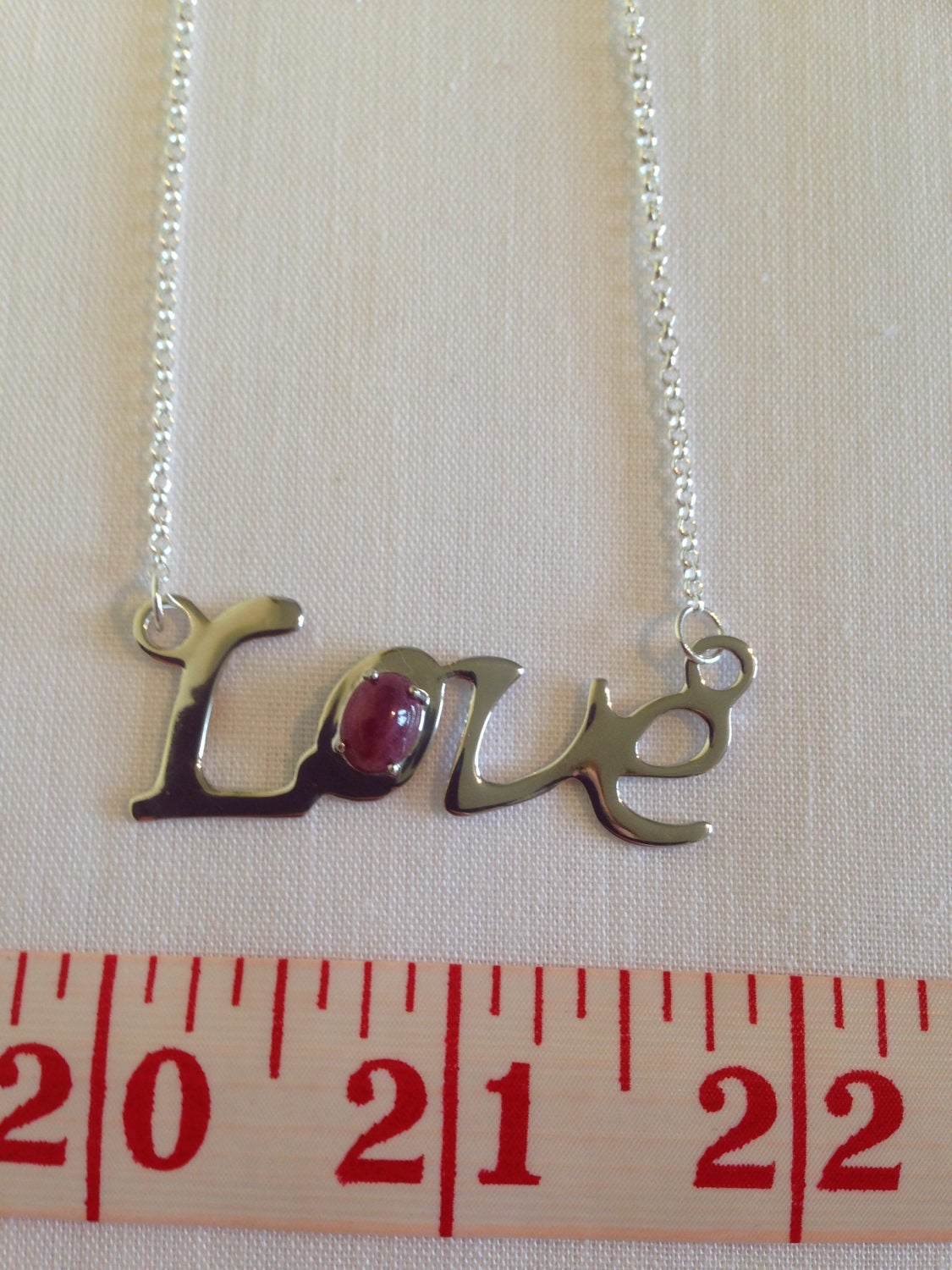 Sterling Silver 'Love' Pendant set with a Ruby and a Sterling Silver ...