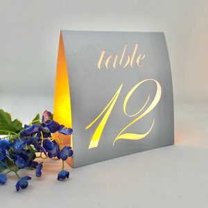 Classic Table Number Luminaries Are Made With Cream, Gold Leaf, or ...