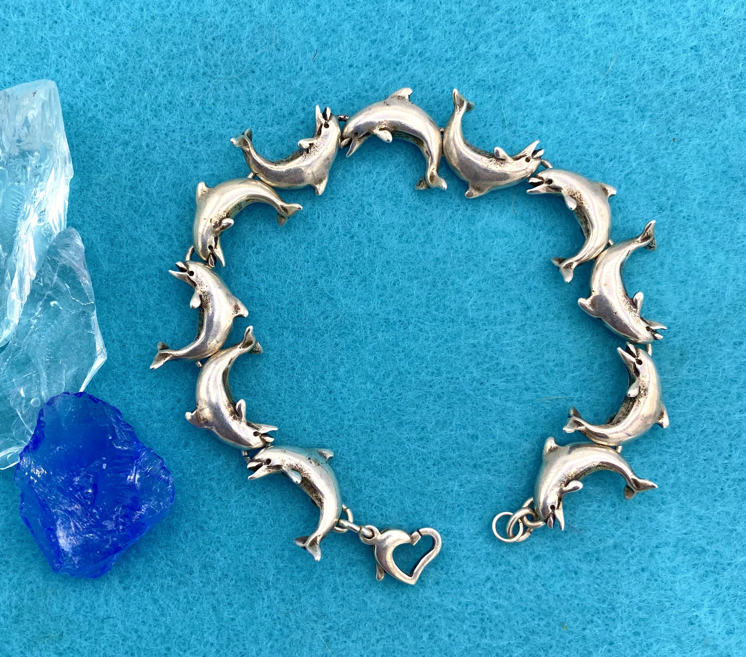 Sterling silver dolphin link bracelet. Marked 925. Designer signed ...