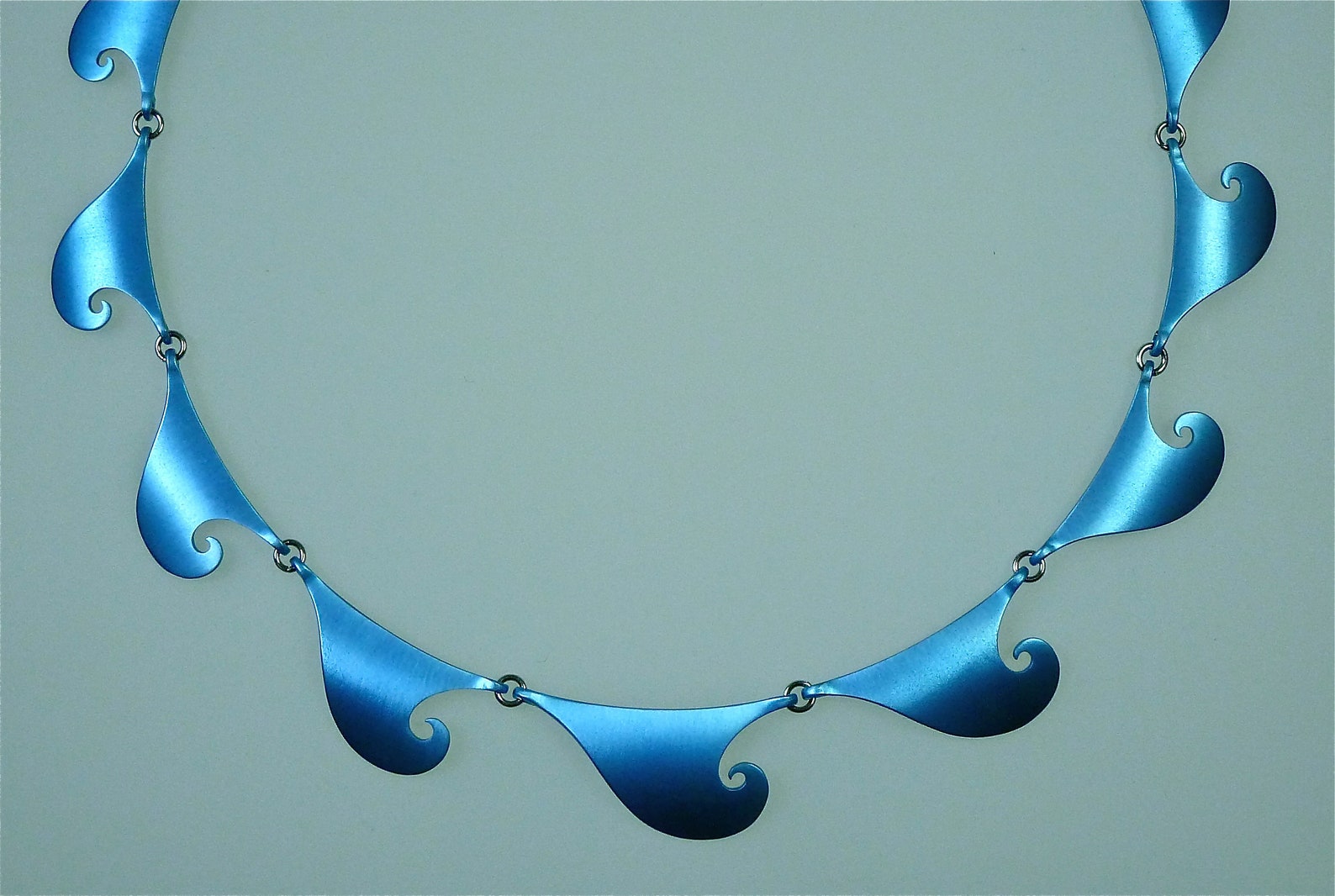 Anodized Titanium and Steel Rings Wave Necklace Invisible Clasp ...