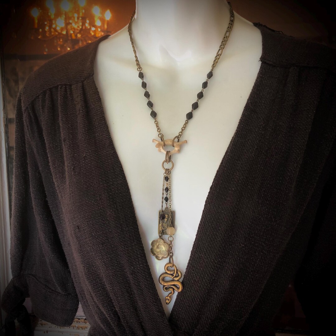 Last Rights Vertebrae Bone Serpent Sacred Heart Relic Mother of Pearl ...