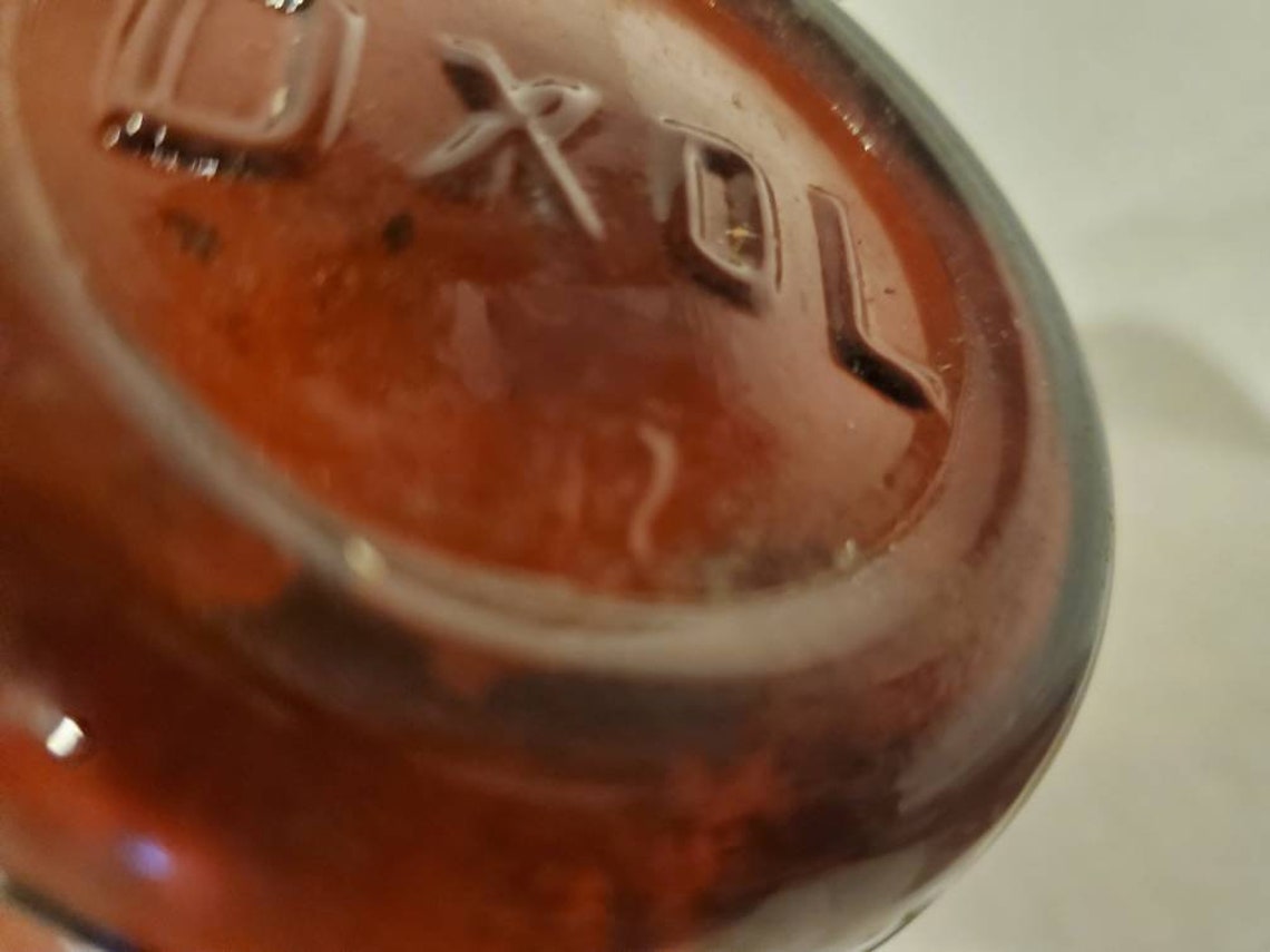 Vintage OXOL Brown Embossed Bottle With Stopper - Etsy