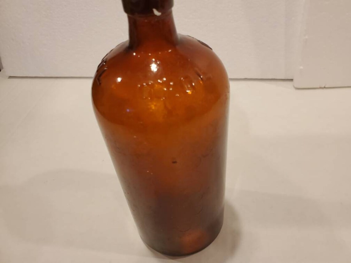 Vintage OXOL Brown Embossed Bottle With Stopper - Etsy