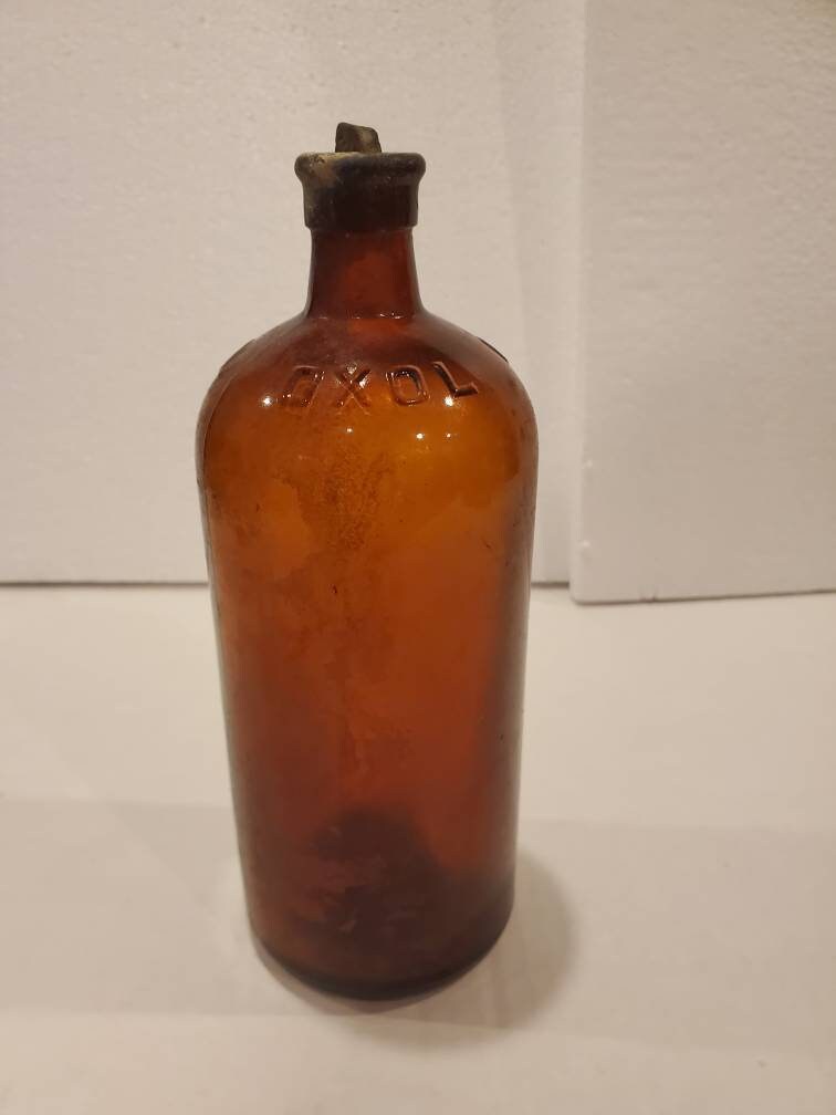 Vintage OXOL Brown Embossed Bottle With Stopper - Etsy