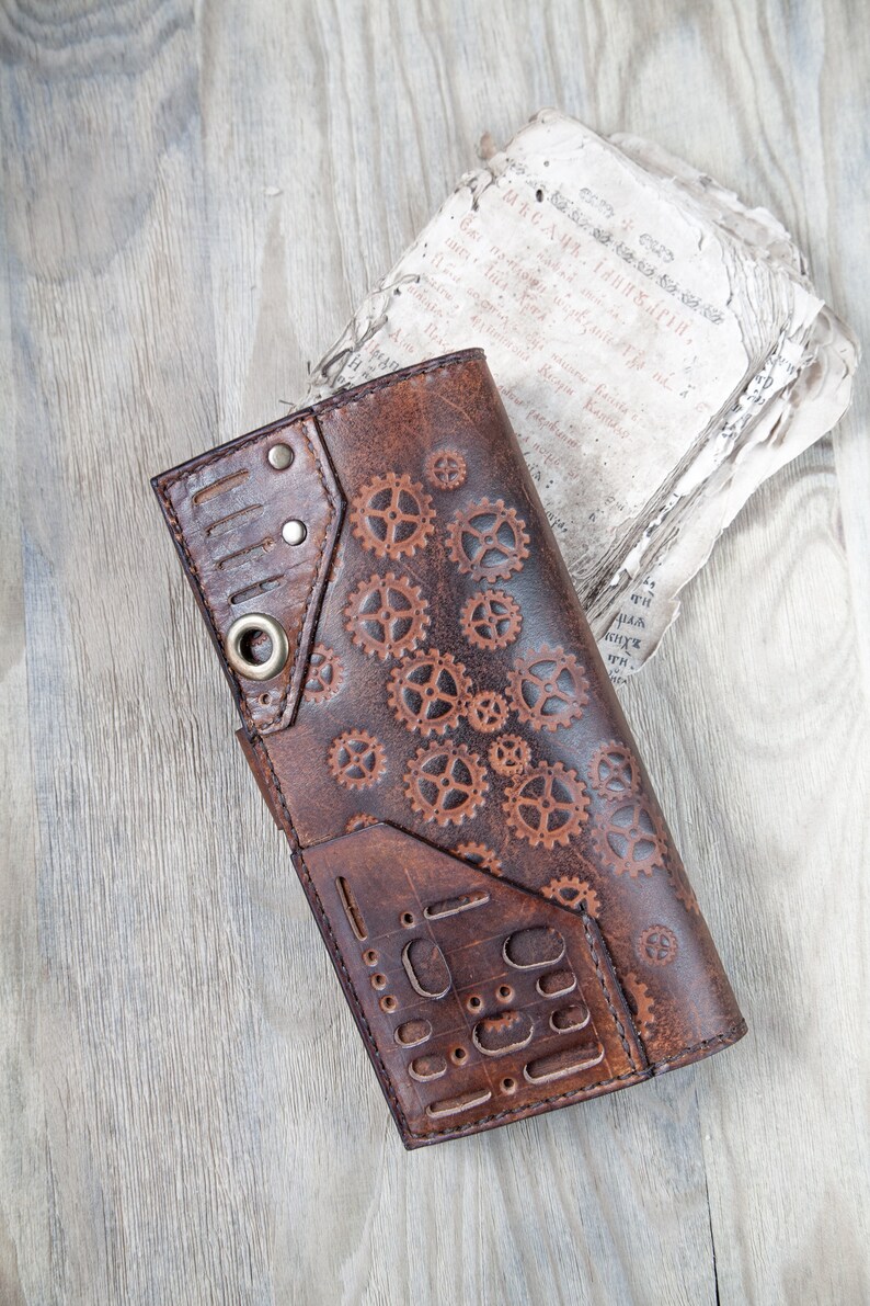 Steampunk hand bag leather wallet with parts of a mechanical | Etsy