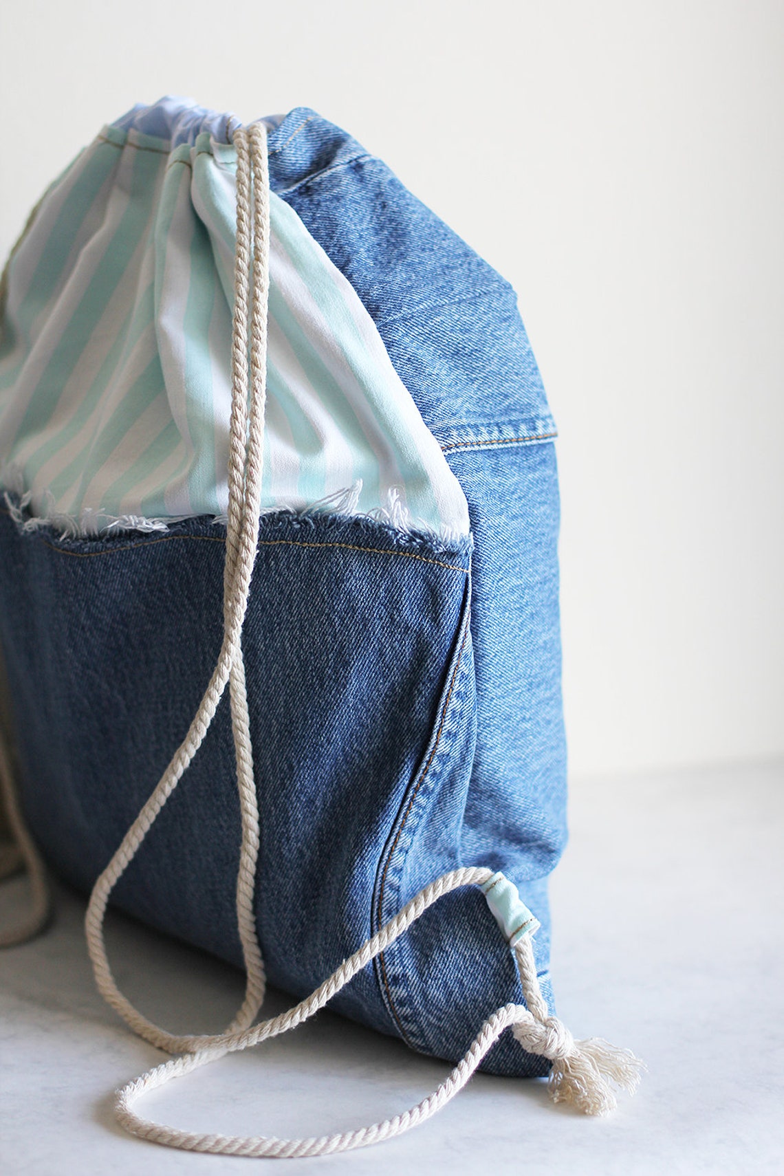 Denim drawstring backpack made out of mid blue Levi's | Etsy