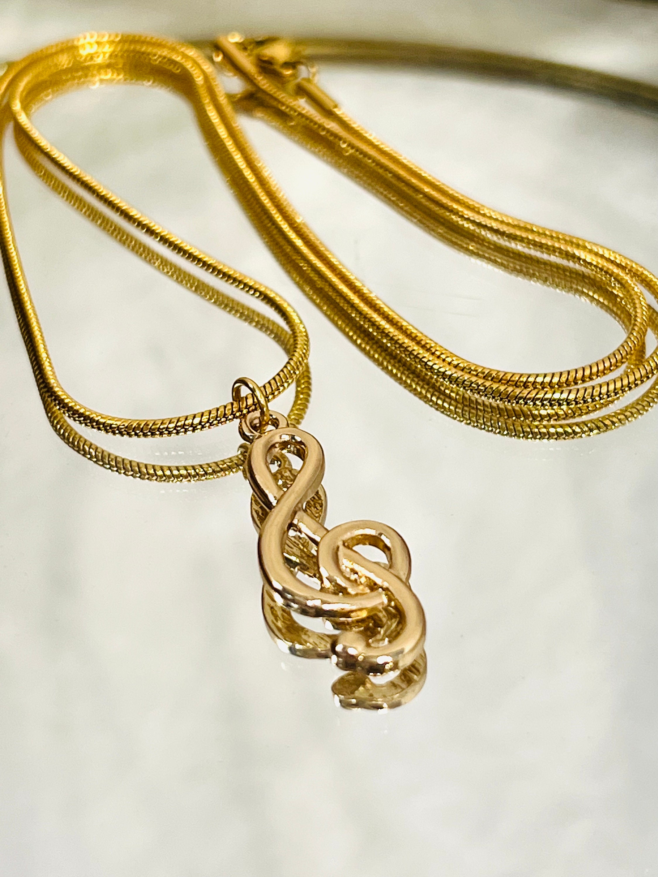 Classic Treble Clef, Music Note, Gold Tone Pendant, on a Stainless ...