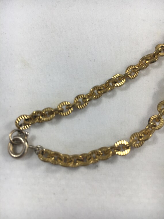 Gold Toned Repousse Circular Pendant - Gem