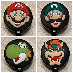Carrete de insignia de Super Mario bros, Mario, Luigi, Yoshi, princesa ...