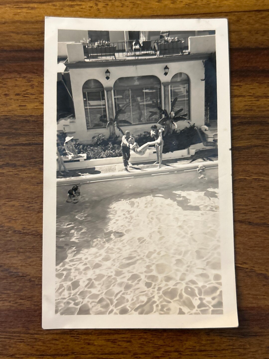 1930s Vintage Black and White Photo Men Throwing Woman Into Swimming ...
