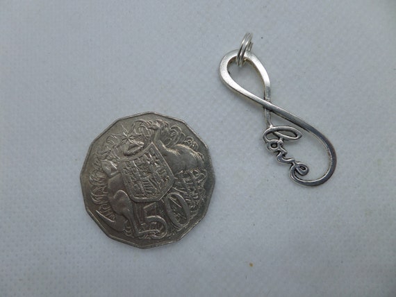 Infinity love in cursive writing silver pendant - Gem