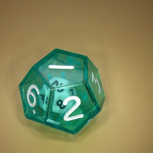 Double D12 - Small Twelve Sided Die in Larger Transparent Twelve Sided ...