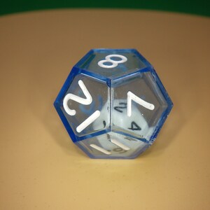 Double D12 - Small Twelve Sided Die in Larger Transparent Twelve Sided ...