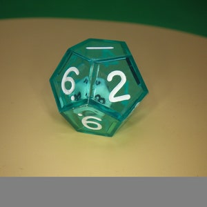 Double D12 - Small Twelve Sided Die in Larger Transparent Twelve Sided ...