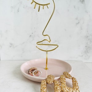 Wire Gold Half Face Abstract Jewellery Stand With Pink Trinket Dish ...