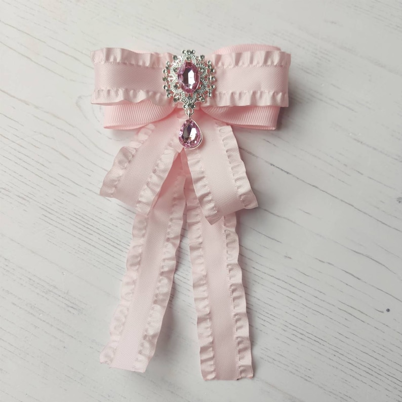 Broche de cinta con volantes rosas - Centro de gota brillante, pinza ...