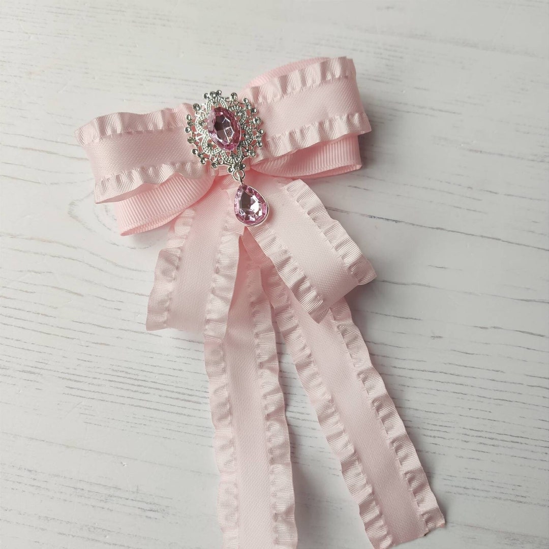 Broche de cinta de cuello rosa con hermoso centro de gota brillante y ...