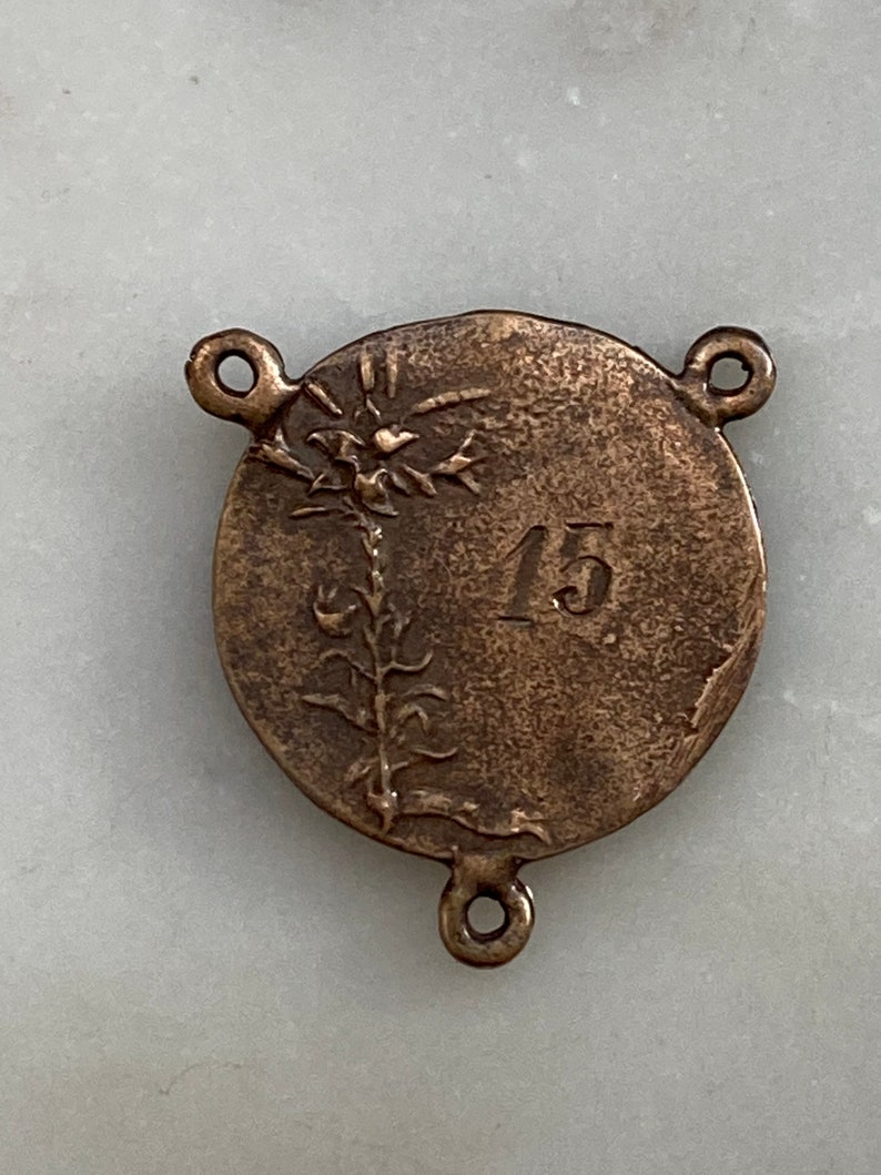 Number 15 on old St. Cecilia medal? : r/Catholicism