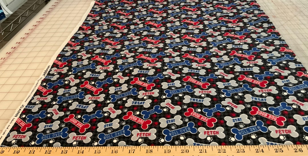 Dog Bone Flannel Fabric: Paw Prints on Black Cotton - Etsy