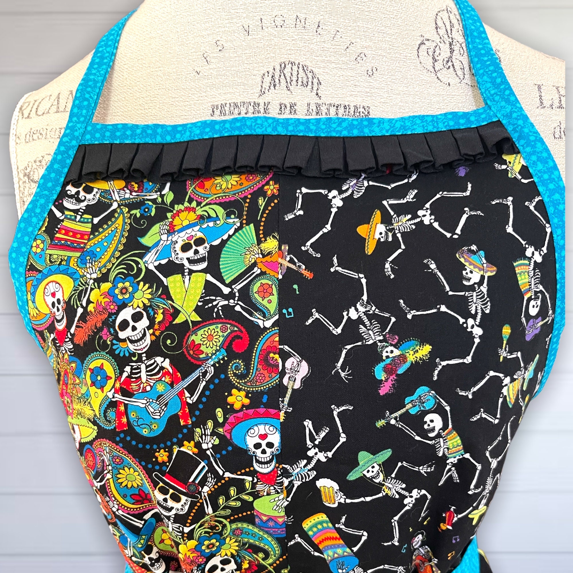 Festive Skeletons Jazz up Colorful Day of the Dead Full Apron, Two ...