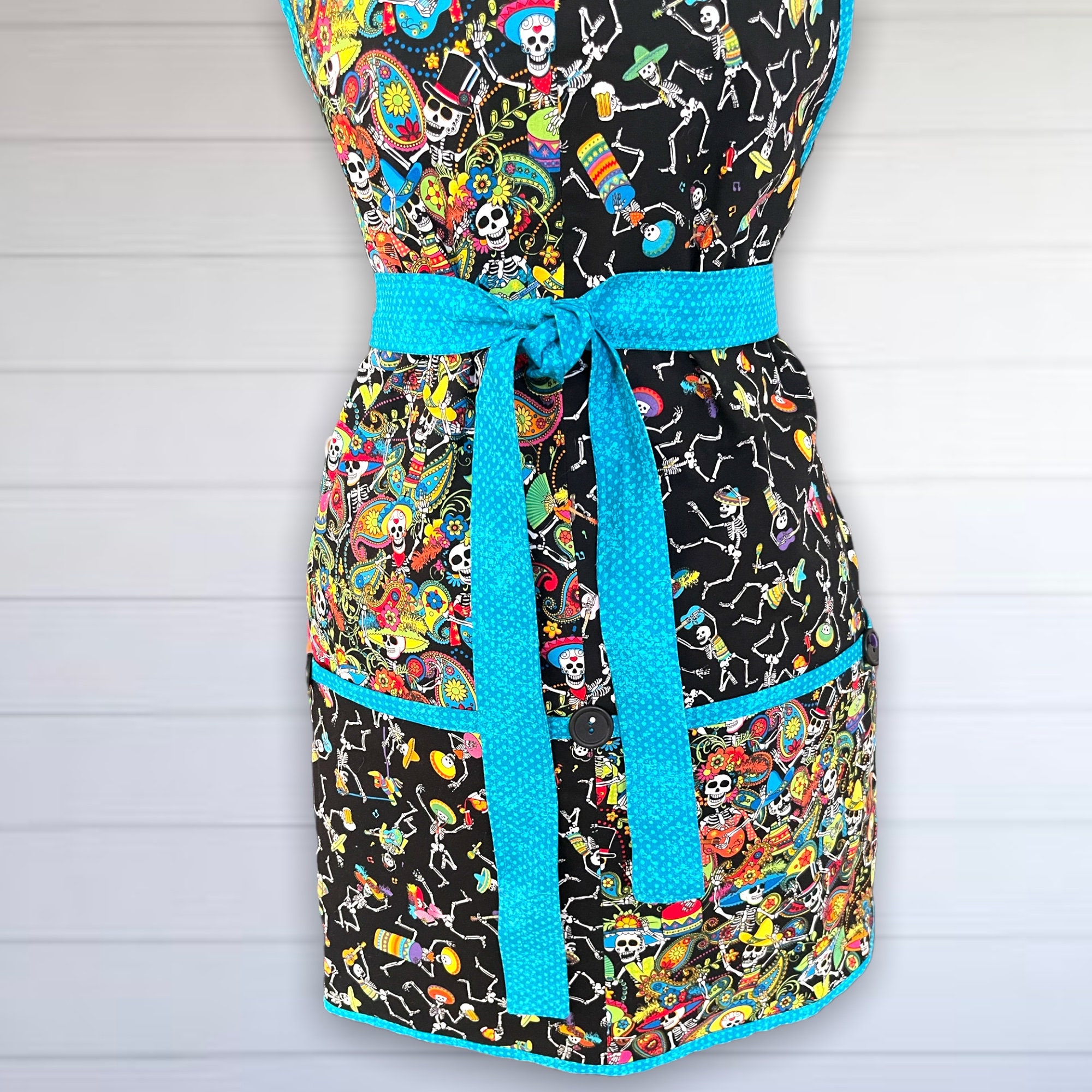 Festive Skeletons Jazz up Colorful Day of the Dead Full Apron, Two ...