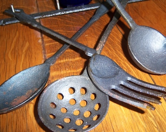 Cast iron wall decor | Etsy